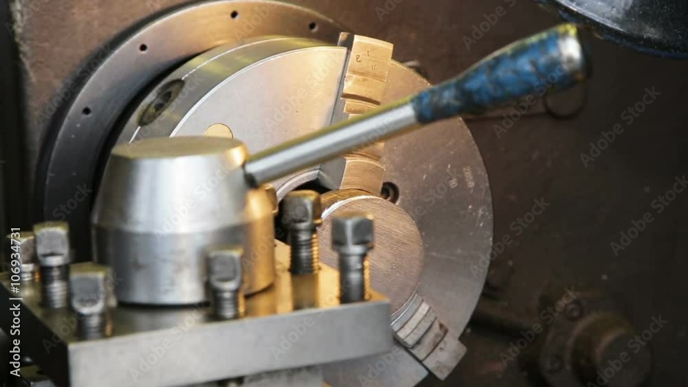 Operator measuring dimensions with calipers on milling machine.Operator ...