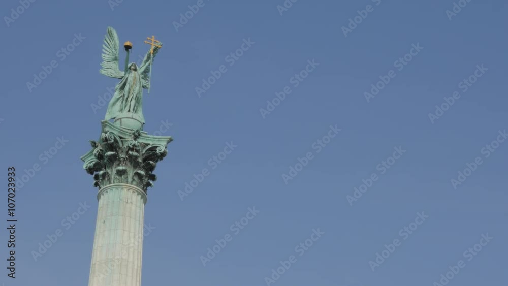 Archangel statue on Hosok ter in city of Budapest tilting 4K 2160p ...