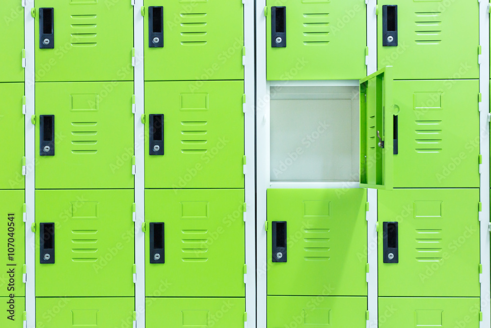 One locker open.Green locker.Green background.Different background ...