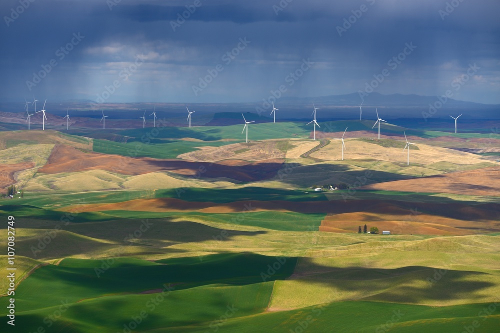 Power plant and the rolling hills farmland with rain and sun. Palouse ...