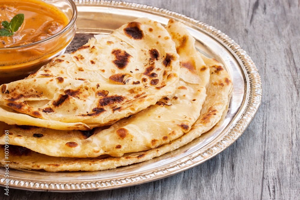 Indian layered Paratha flat bread Stock Photo | Adobe Stock