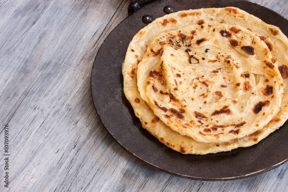 Indian layered Paratha flat bread Stock Photo | Adobe Stock