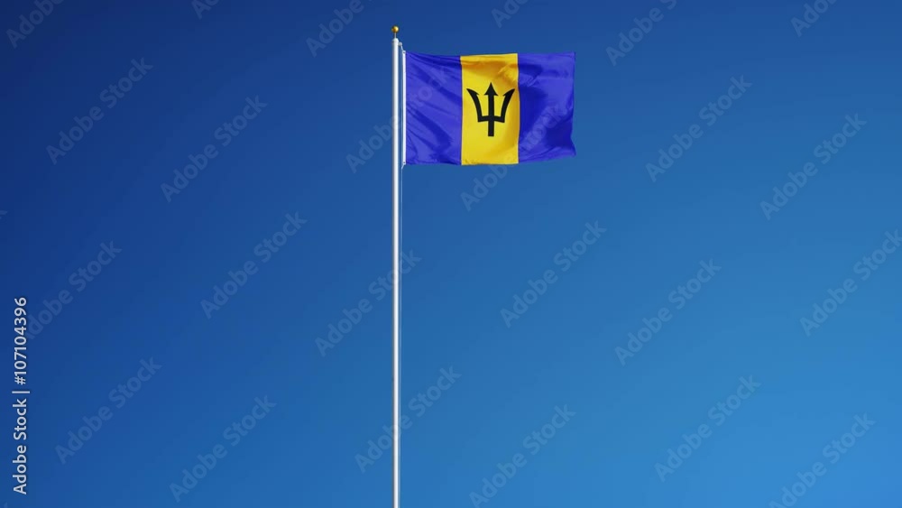 Barbados flag waving in slow motion against clean blue sky, seamlessly ...