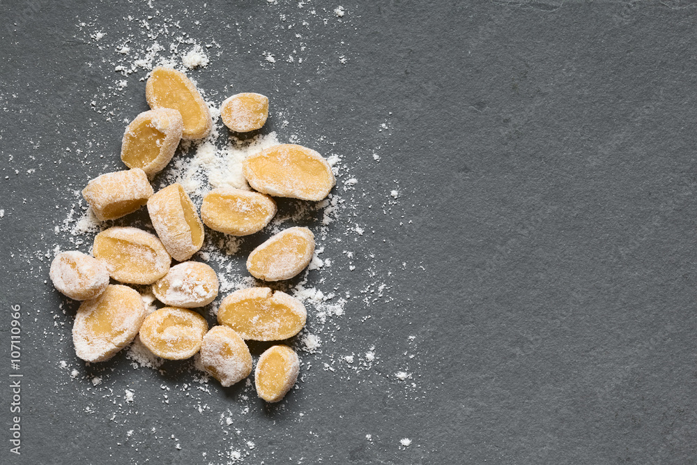 Raw homemade Hungarian Csipetke soup pasta or noodle, made of flour ...