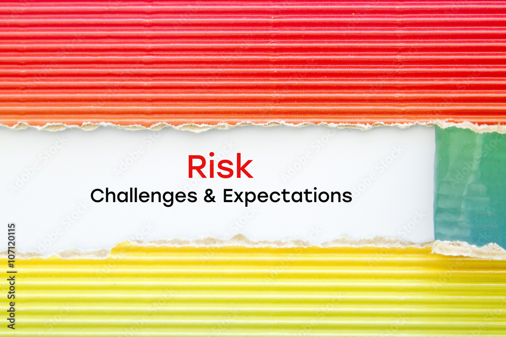 Risk - Challenges and Expectations written under torn paper. Stock ...