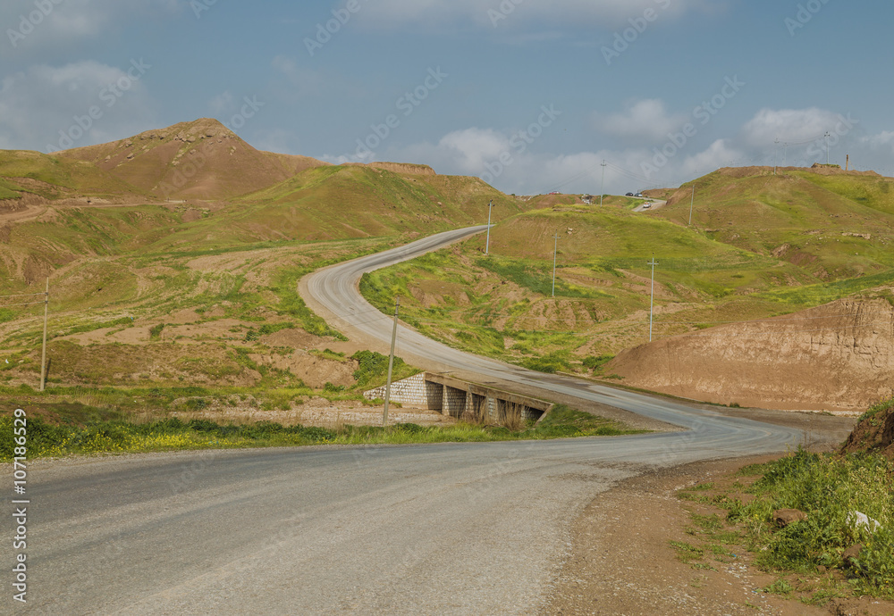 Curved way in Iraqi Kurdistan region between Erbil and Kirkuk city ...