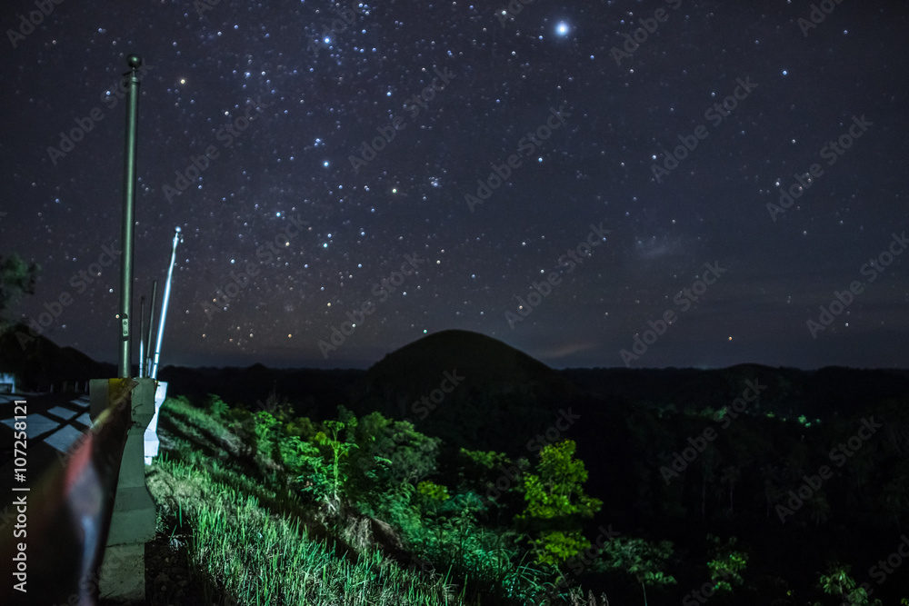 Night view of Chocolate hills. Night sky full of stars. Bohol Island ...