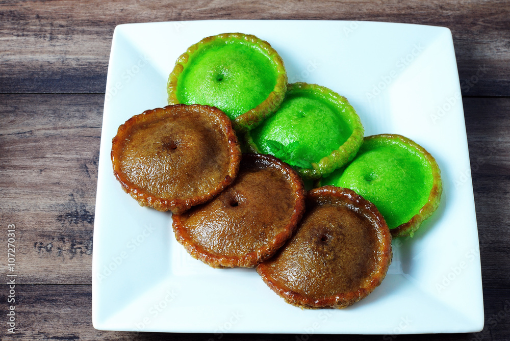Kuih Pinjaram on a plate. Kuih Pinjaram is a traditional kuih for the ...