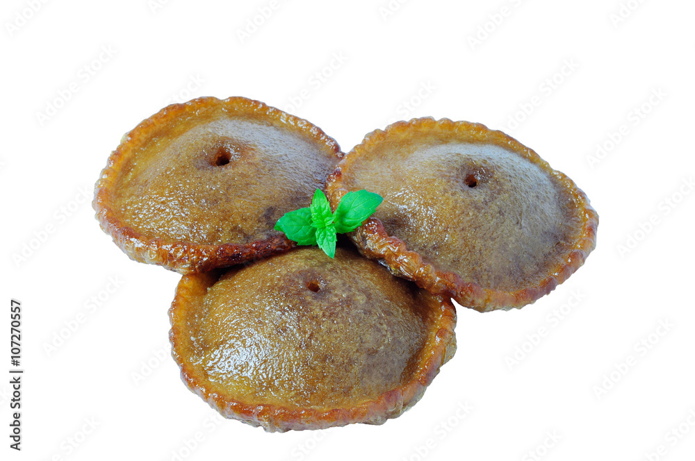 Brown Kuih Pinjaram on white background. Kuih Pinjaram is a traditional ...