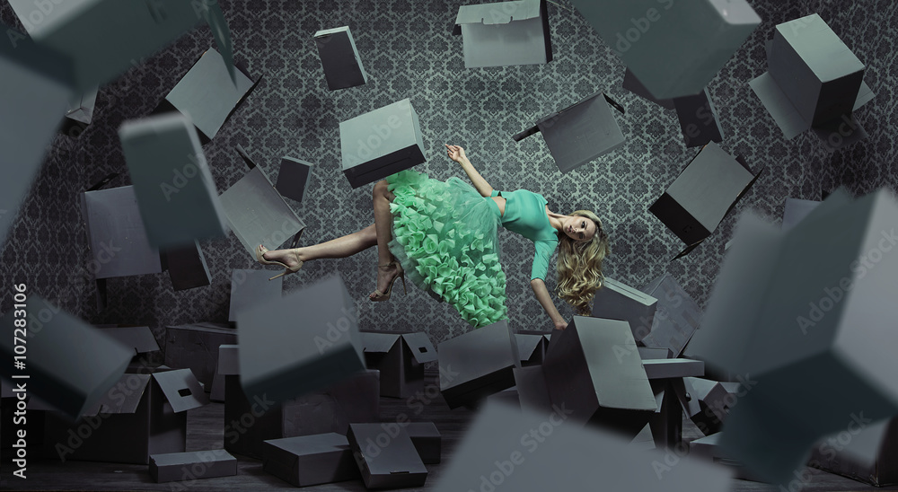 Fine art photo of a beautiful levitating woman Stock Photo | Adobe Stock
