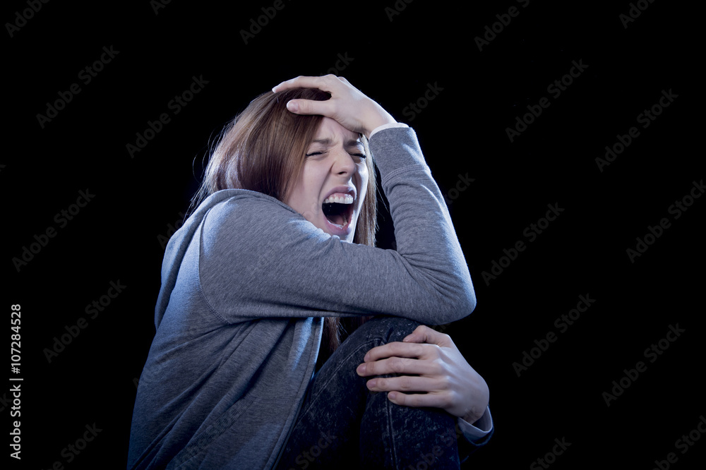 teenager girl with red hair feeling lonely screaming desperate as ...