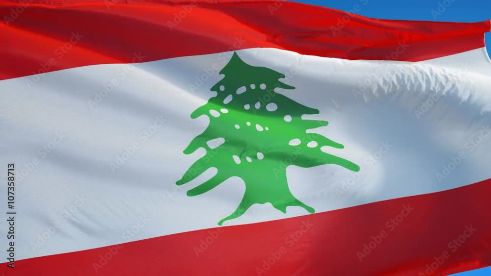 Lebanon flag waving in slow motion against clean blue sky, seamlessly ...