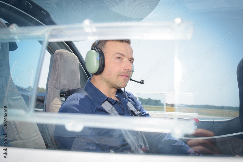 Side view of pilot in aircraft Stock Photo | Adobe Stock