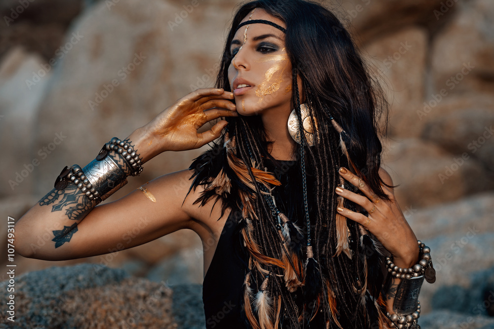 tribal woman posing outdoors Stock Photo | Adobe Stock