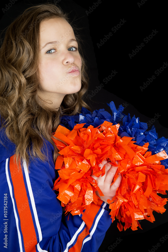 Cute side view of teen cheerleader puckering lips kissing eyes o Stock ...