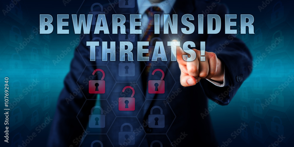 Employee Pressing BEWARE INSIDER THREATS! Stock Photo | Adobe Stock