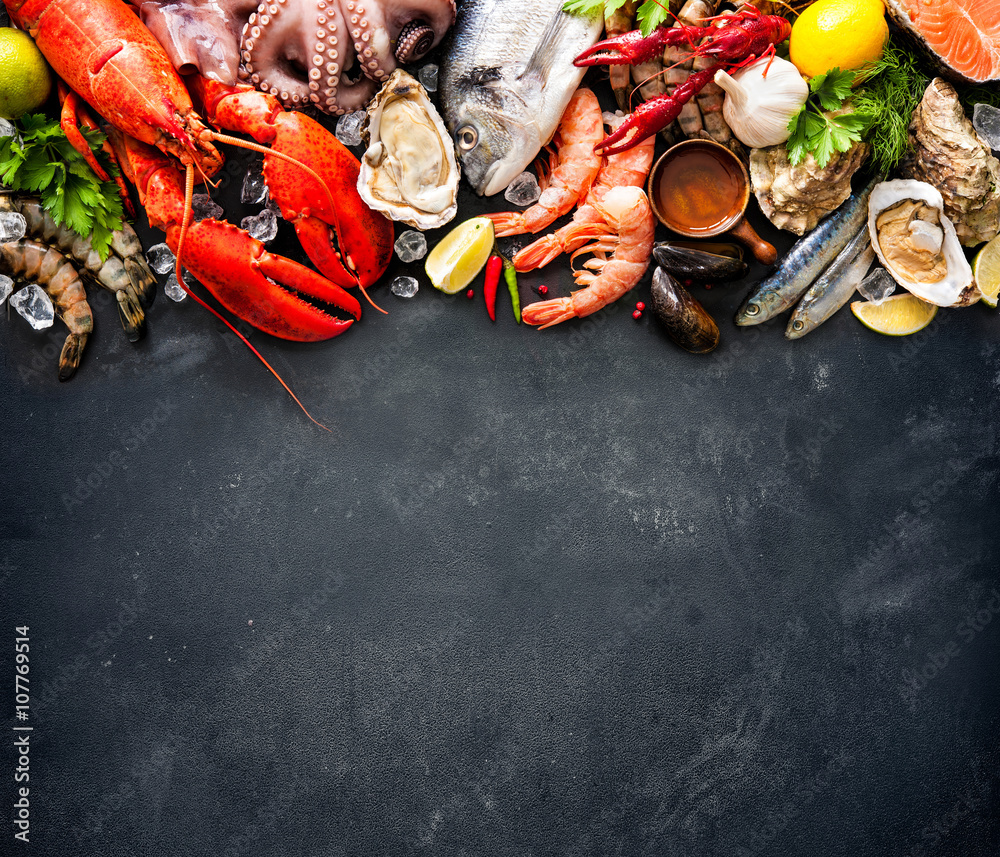 Shellfish plate of crustacean seafood with fresh lobster, mussels ...