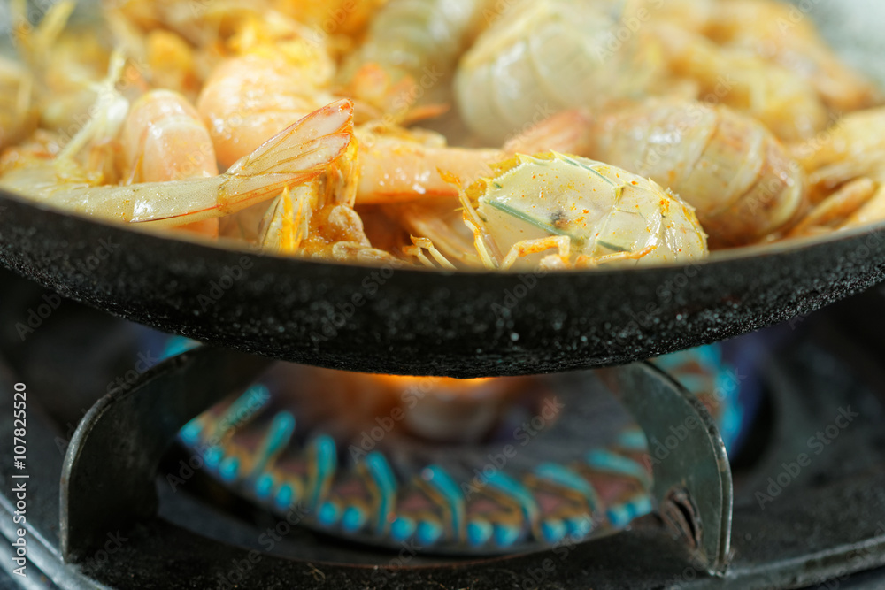 Silver Mantis Shrimp and Prawn cooked in the wok. Upper half picture ...