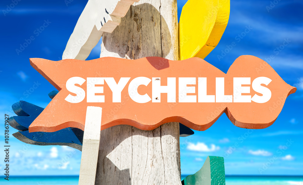 Seychelles signpost with beach background Stock Photo | Adobe Stock