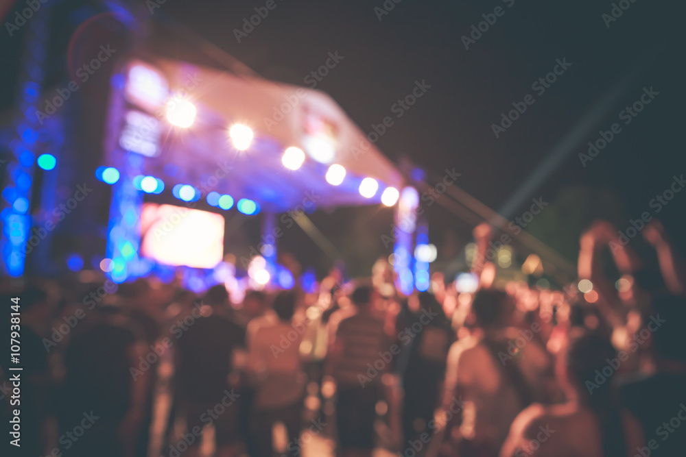 Crowd in front of concert stage with dancer blurred Stock Photo | Adobe ...