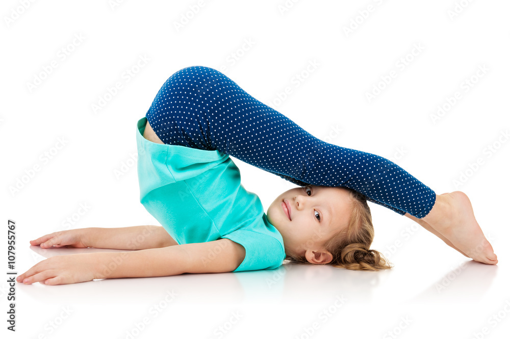 Little girl doing fitness exercises Stock Photo | Adobe Stock