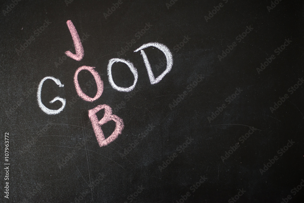 Good Job words written on blackboard over textured wall. Motivational ...