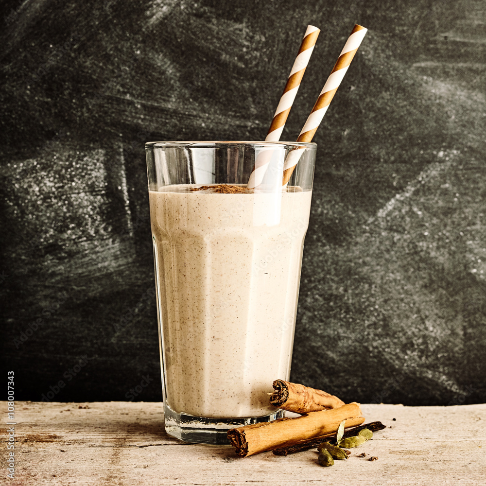 Single glass of blended cinnamon drink with straws Stock Photo | Adobe ...