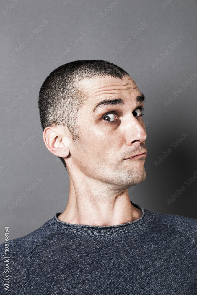 surprise concept - dubious man with dark circles pouting questioning ...