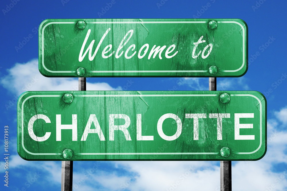 charlotte vintage green road sign with blue sky background Stock ...