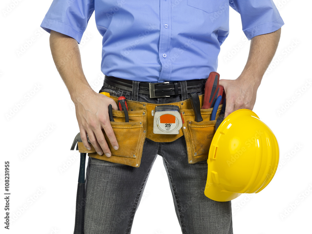 mid section of a man with tool belt and hard hat. Stock Photo | Adobe Stock