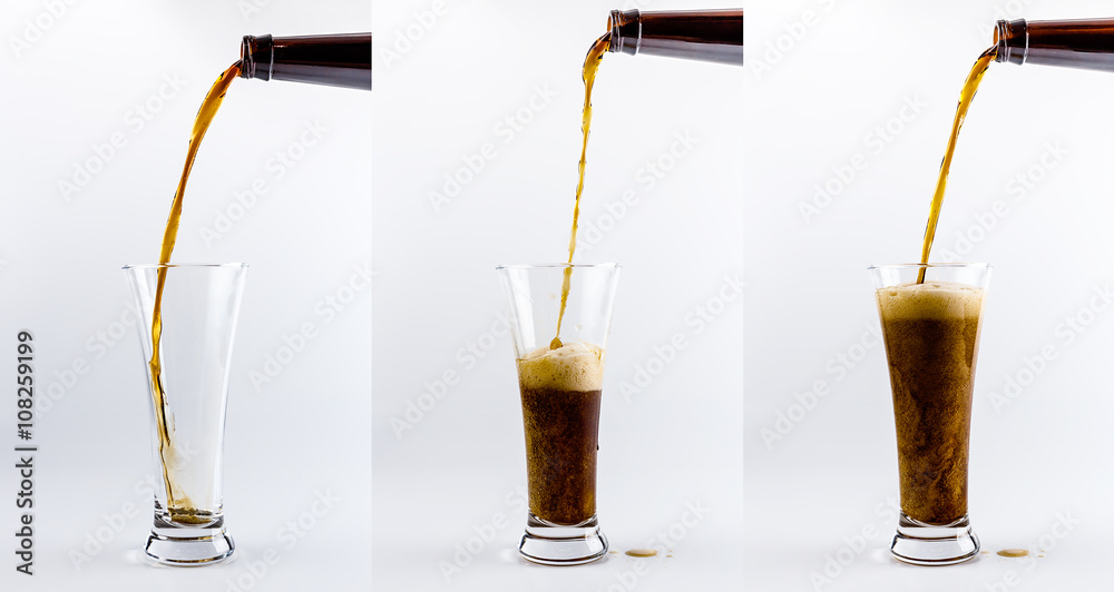 Pouring process of dark stout beer into a beer glass, splashes, drops ...