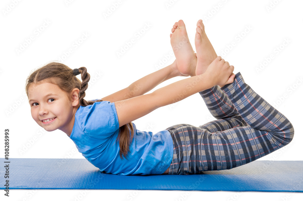Little girl doing fitness exercises Stock Photo | Adobe Stock