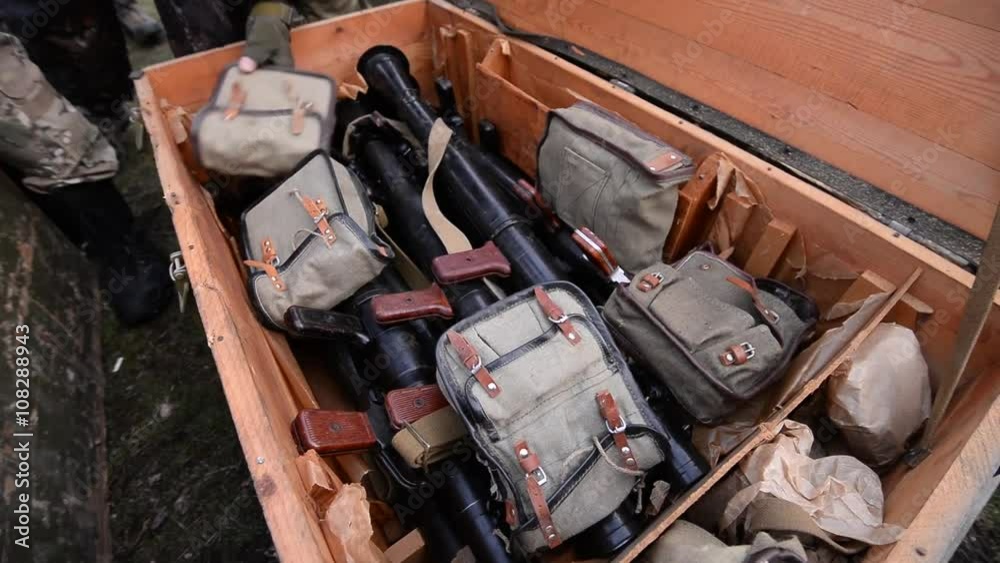 Military wooden box with weapon.Top view angle.Soldiers take grenade ...