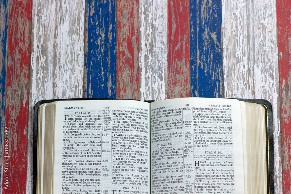 Open Bible on a Red, white and blue background Stock Photo | Adobe Stock