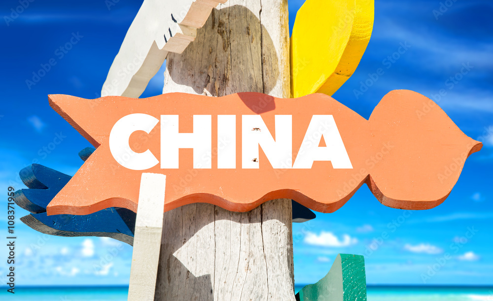 China signpost with beach background Stock-Foto | Adobe Stock