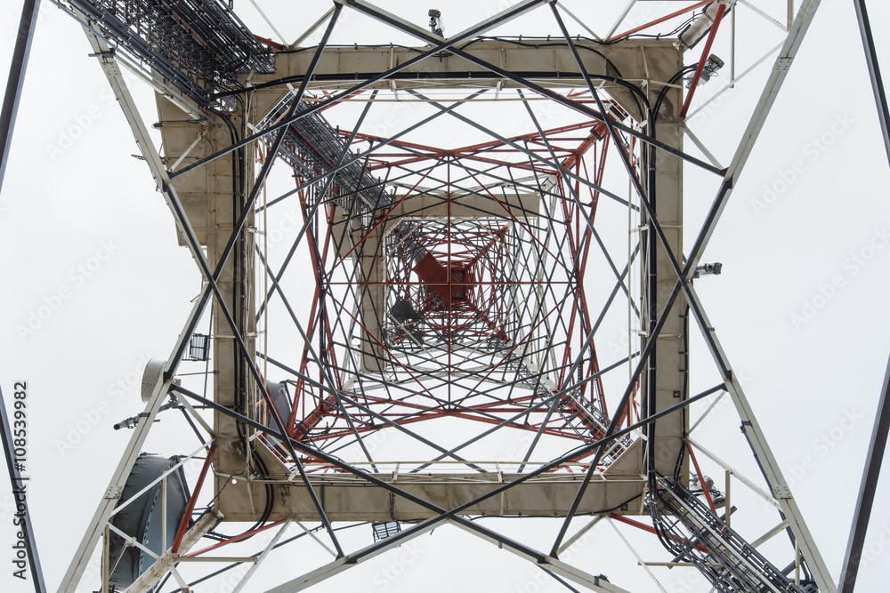 Telecommunication tower with antennas from below Stock Photo | Adobe Stock