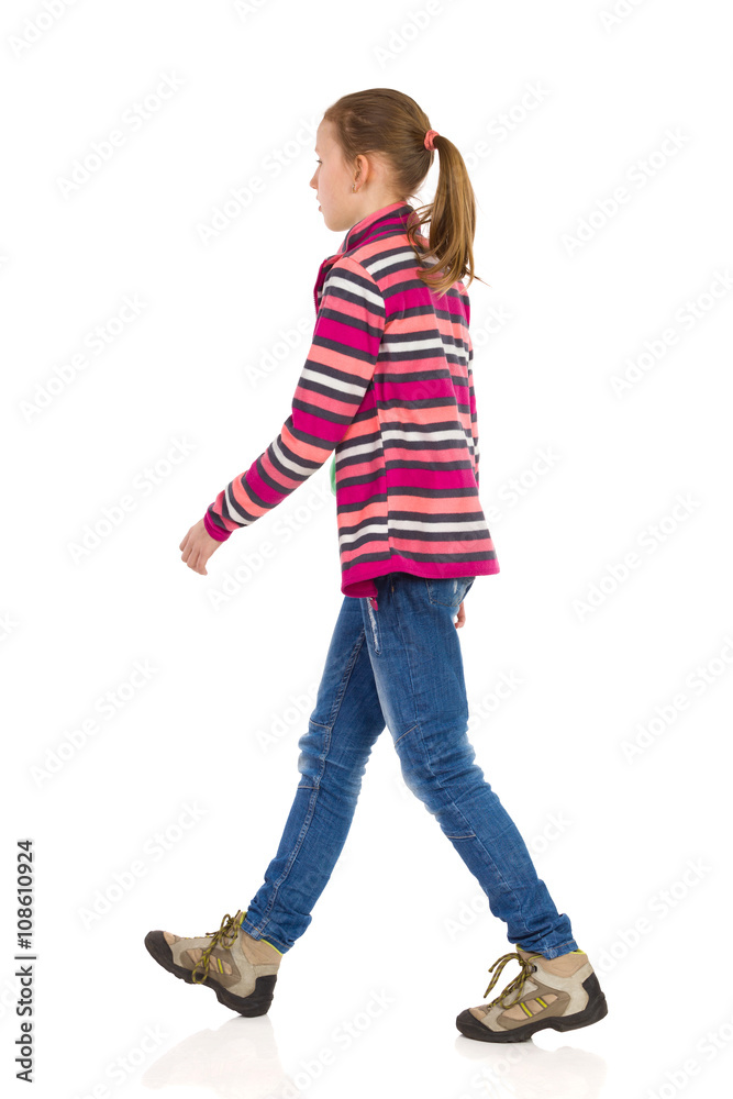 Girl Walking Side View Stock Photo | Adobe Stock