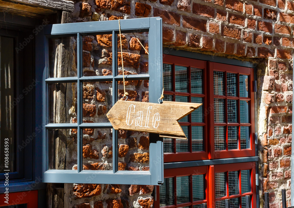 Beautiful vintage stained glass window with open shutters in old brick ...