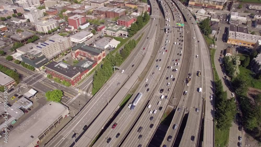 Rotating Aerial from Cars on Interstate 5 Freeway to Skyline Buildings ...
