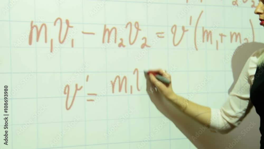 Girl writing physics formula on interactive whiteboard Stock ビデオ ...