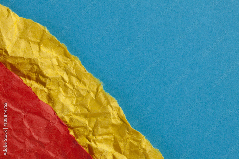 Fotografia do Stock: red, yellow and blue ripped paper | Adobe Stock