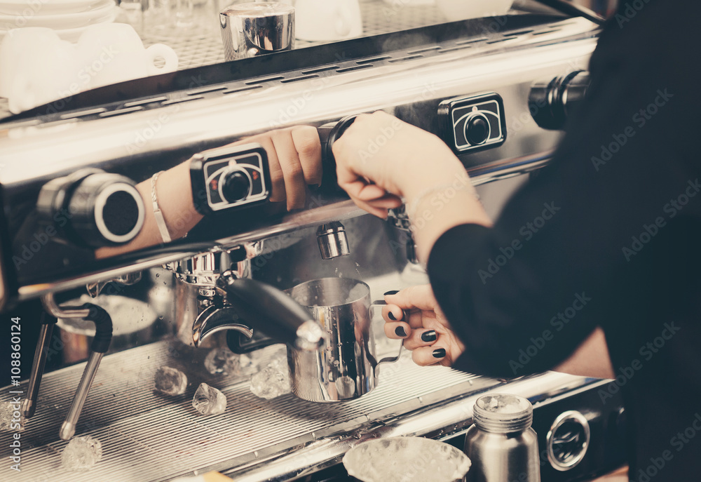 Barista preparing coffee in a cafe. Professional coffee brewing ...
