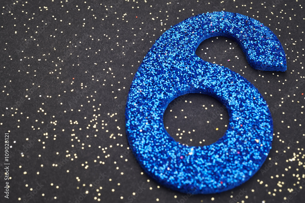 Number six blue color over a black background. Anniversary Stock Photo ...