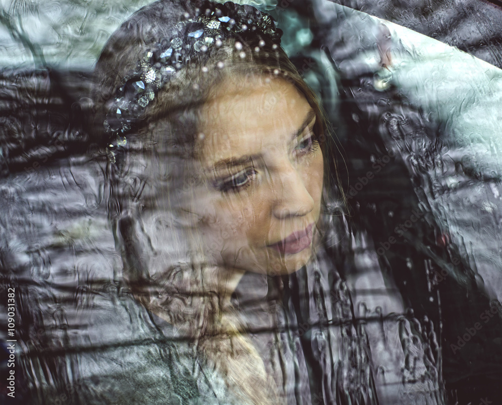 Sad woman in the rain, a sad face in the window Stock Photo | Adobe Stock