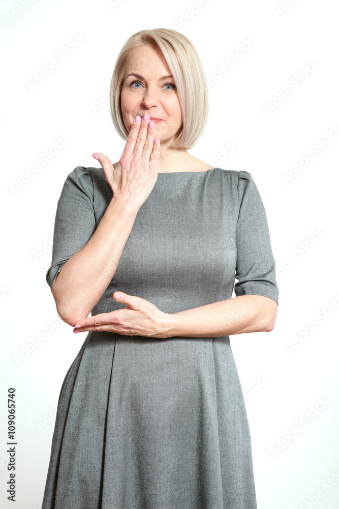 Portrait woman with finger on lips, or secret gesture hand sign ...