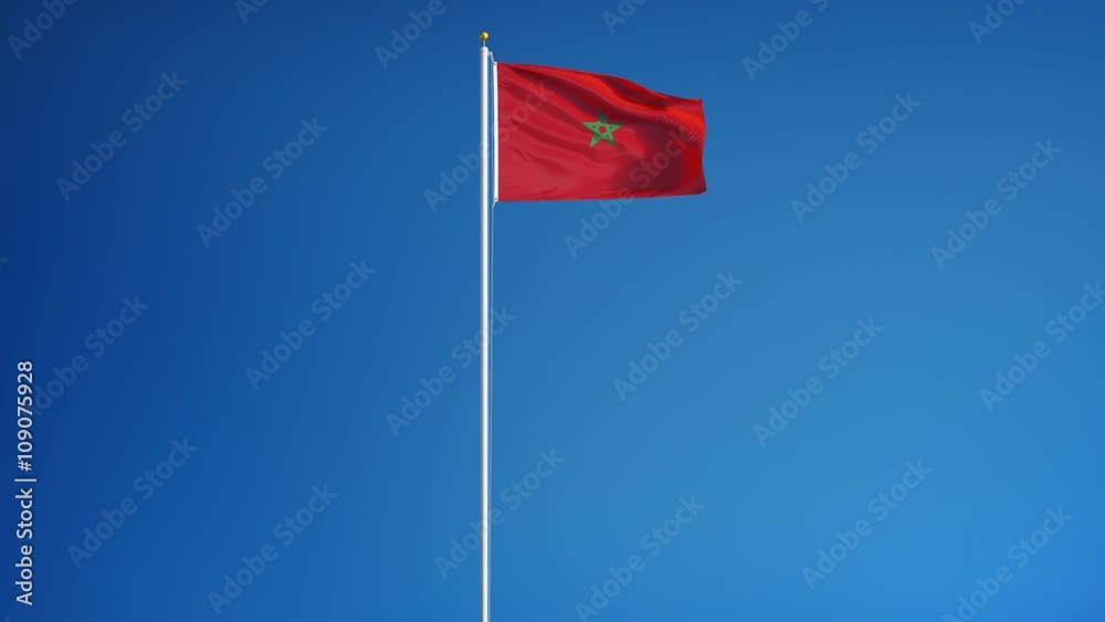 Morocco flag waving in slow motion against clean blue sky, seamlessly ...