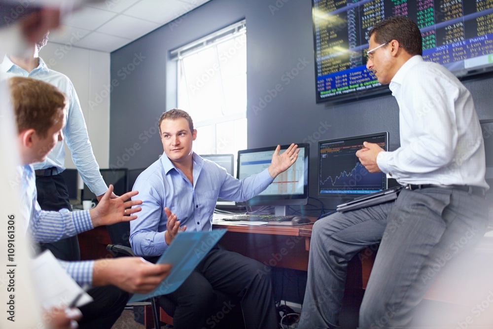 Colleagues in office having discussion, hand gestures Stock Photo ...