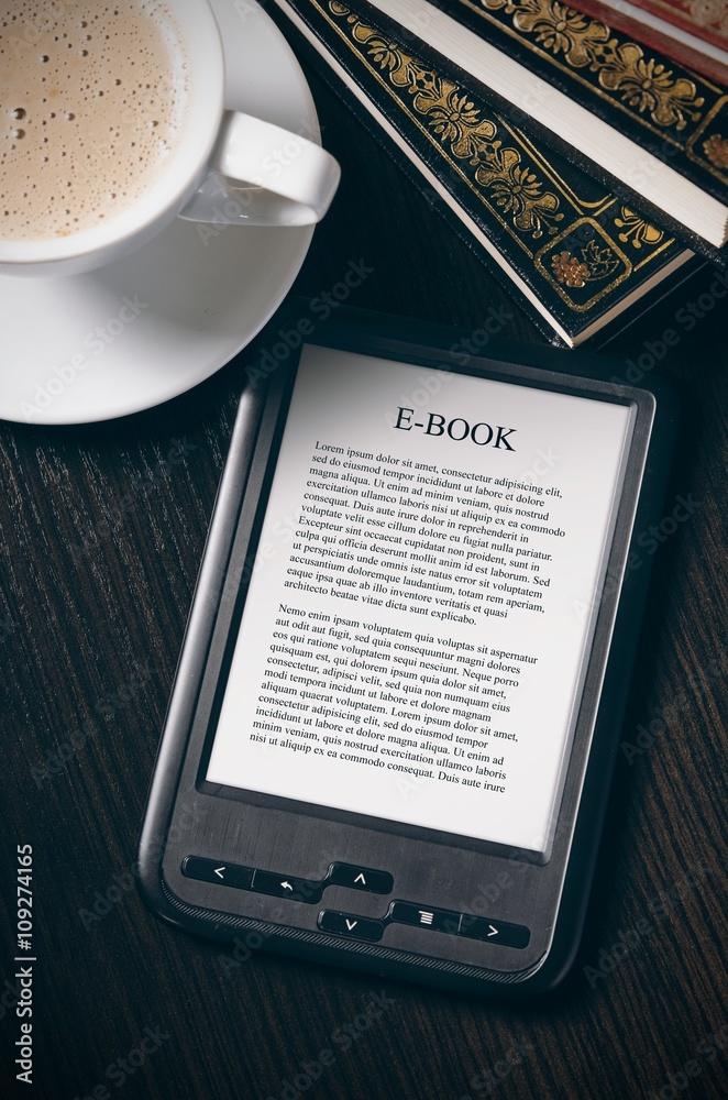 E-book reader device on desk in library Stock Photo | Adobe Stock