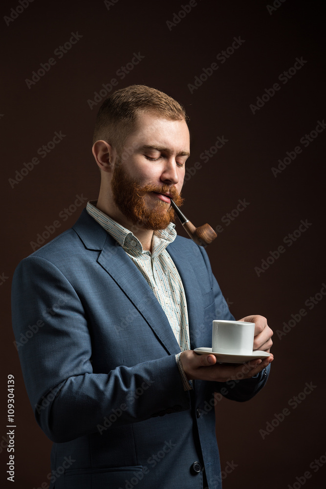 Portrait of man in suit smoking pipe Stock Photo | Adobe Stock