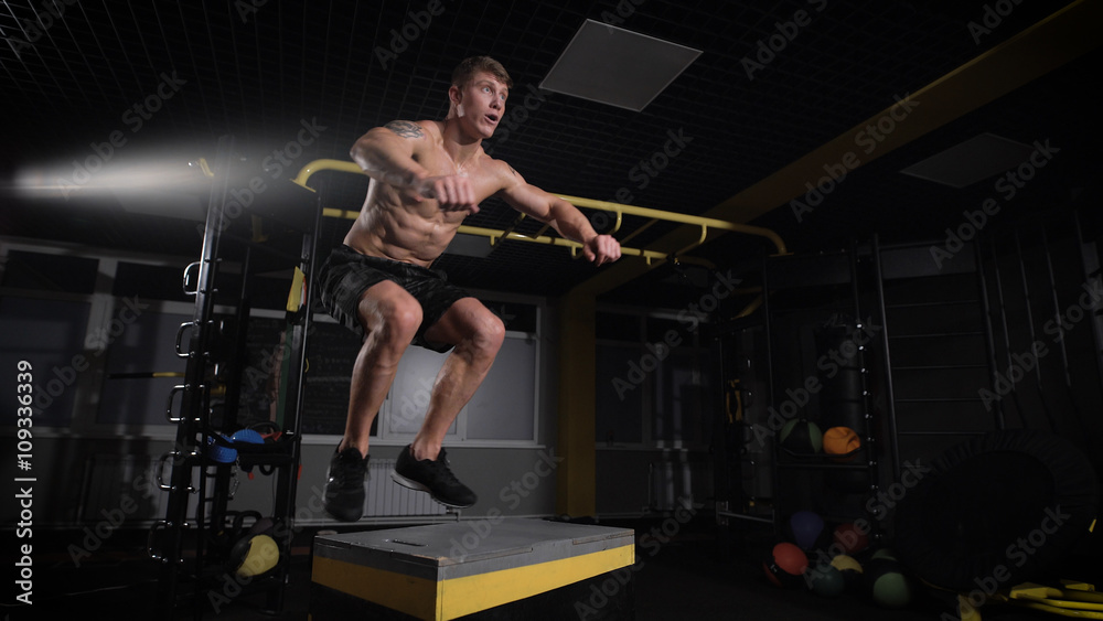 Sportsman working out his body in box jumping Stock Photo | Adobe Stock